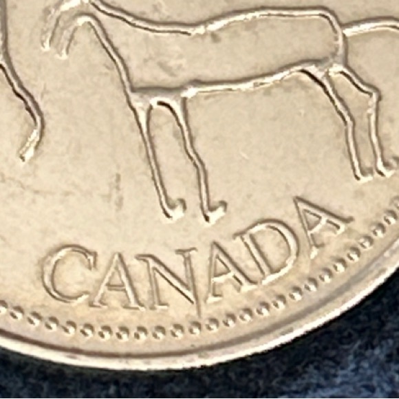 1999 canadian 25 cents | Other | 999 Rare Error On N In Canadian Coin ...
